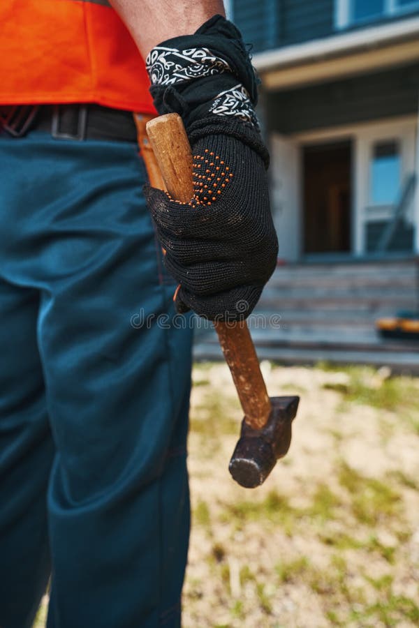 Person Holding Hammer while Looking at House Stock Photo - Image of ...