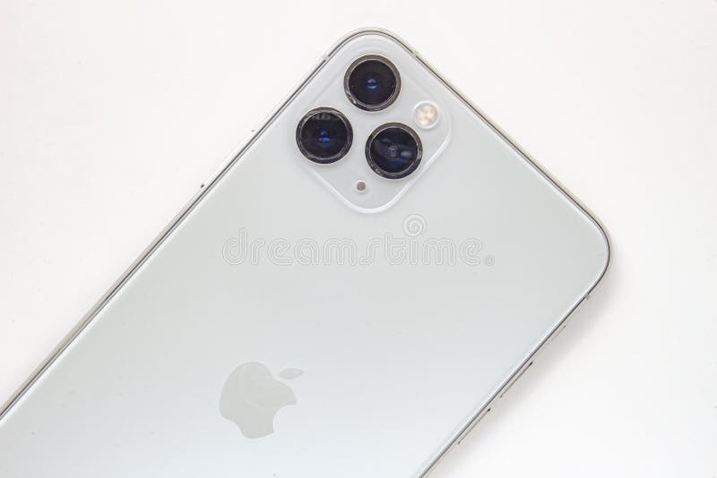 A Person Holding an IPhone 11 Pro Max on the Back Side Cameras ...