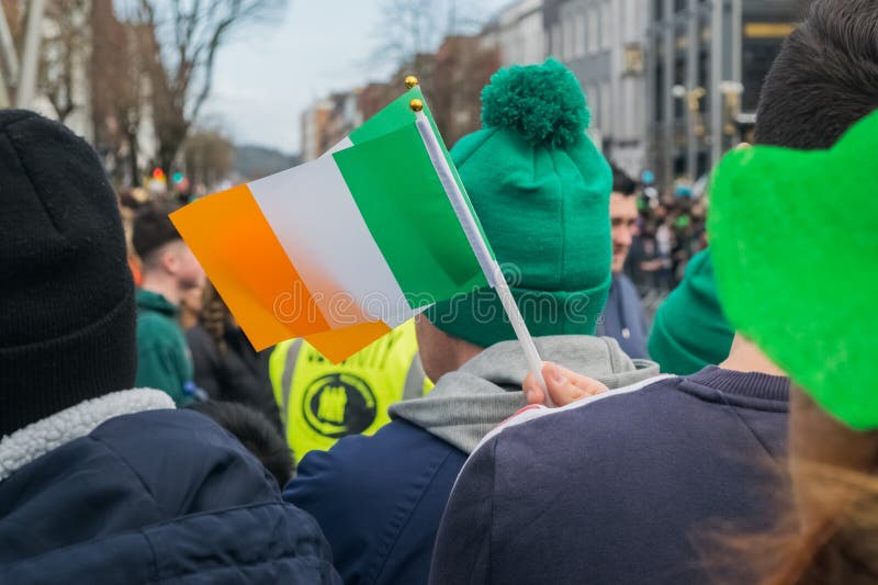 Person Holding the Irish Flag in Saint Patrick S Day Parade Editorial ...