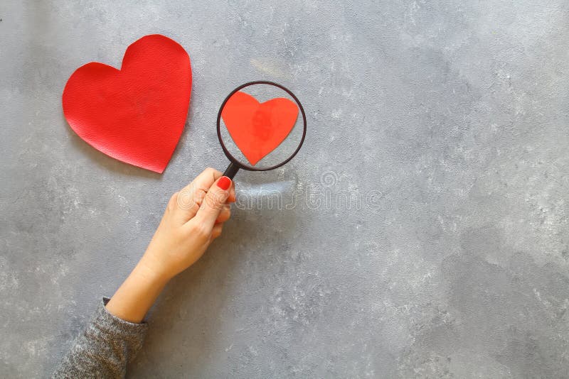 Person Holding Magnifying Glass and Search Love Stock Photo - Image of ...