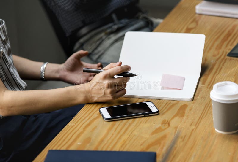 Person Holding Pen And Notebook Stock Photo - Image of close, workspace ...