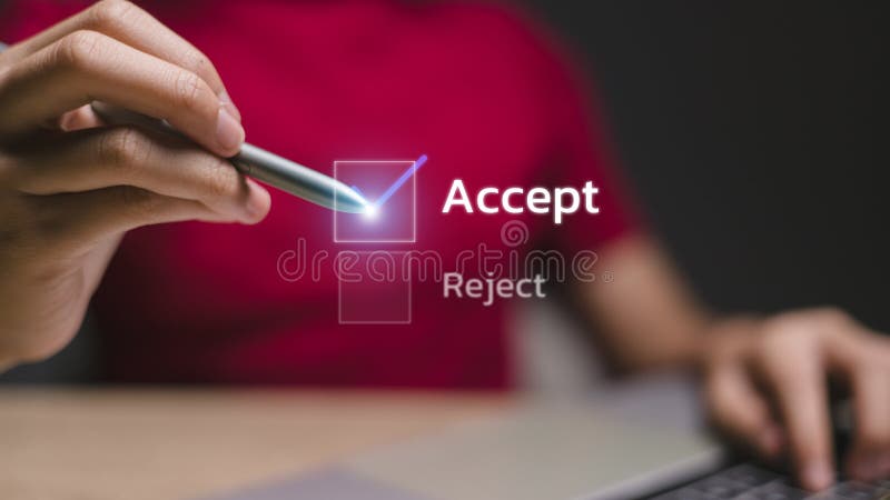 A Person is Holding a Pen and Writing the Word Accept on a Computer ...