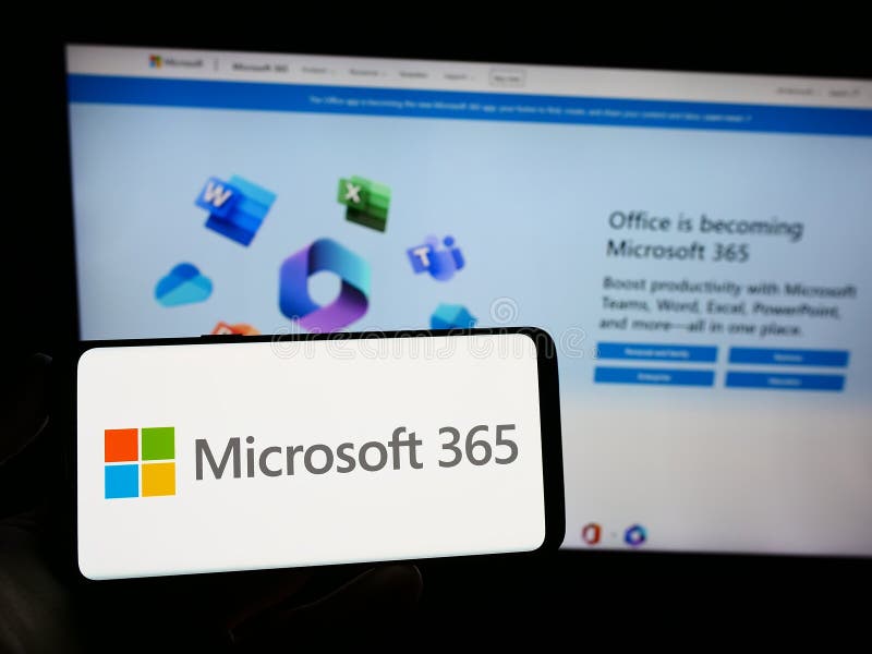 Person Holding Smartphone with Logo of Productivity Software Microsoft ...