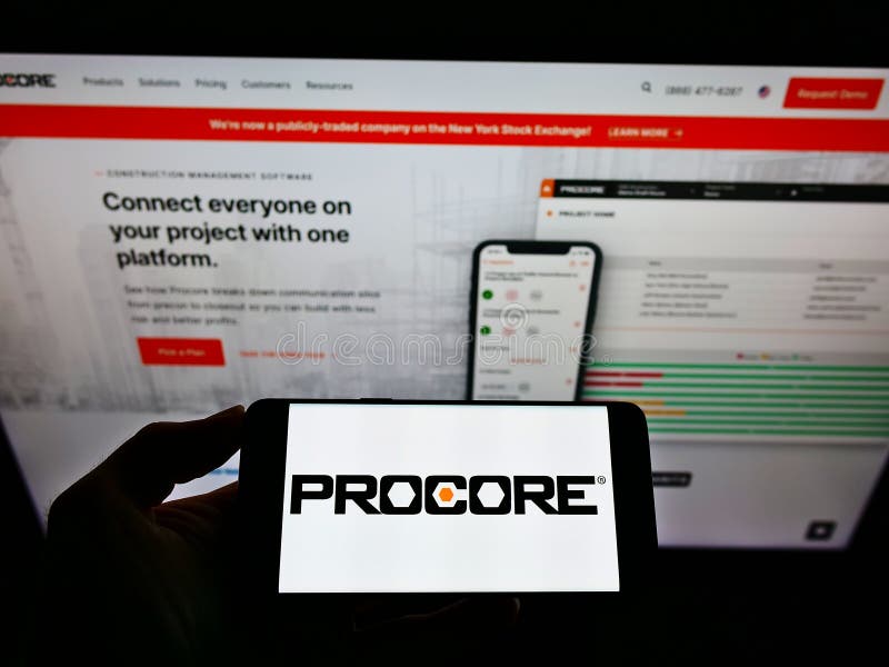 Person Holding Smartphone with Logo of US Software Company Procore ...