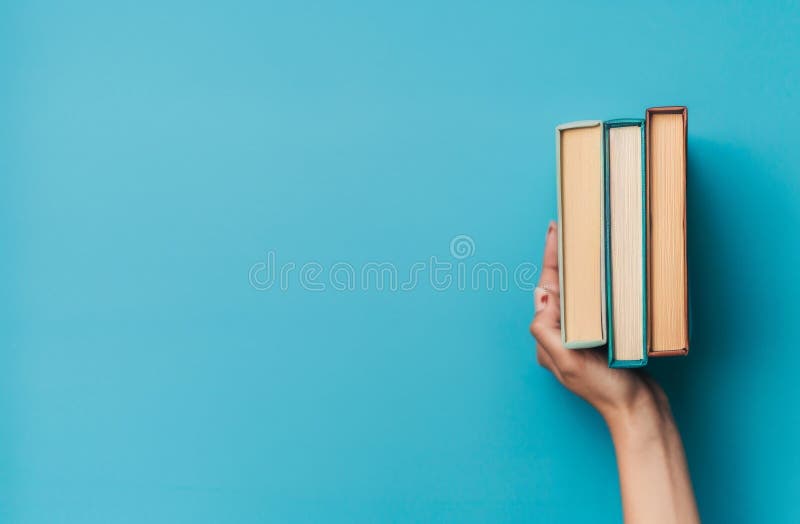 Person Holding a Stack of Books Stock Photo - Image of literary, person ...