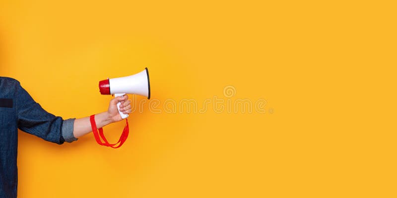 Person Holding a White and Red Megaphone in the Hand Stock Photo ...