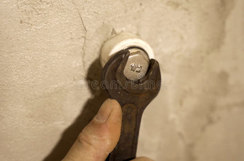 Person Holding Wrench in Left Hand Stock Image - Image of laborer ...