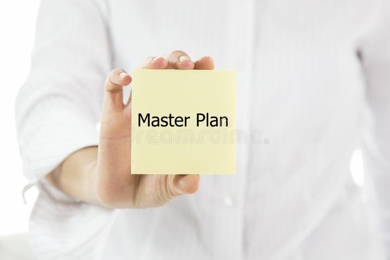 A Person is Holding a Yellow Sticky Note that Says Master Plan Stock ...