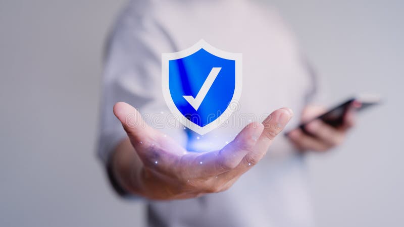 Person Holds a Glowing Shield with a Checkmark Icon, Symbolizing ...