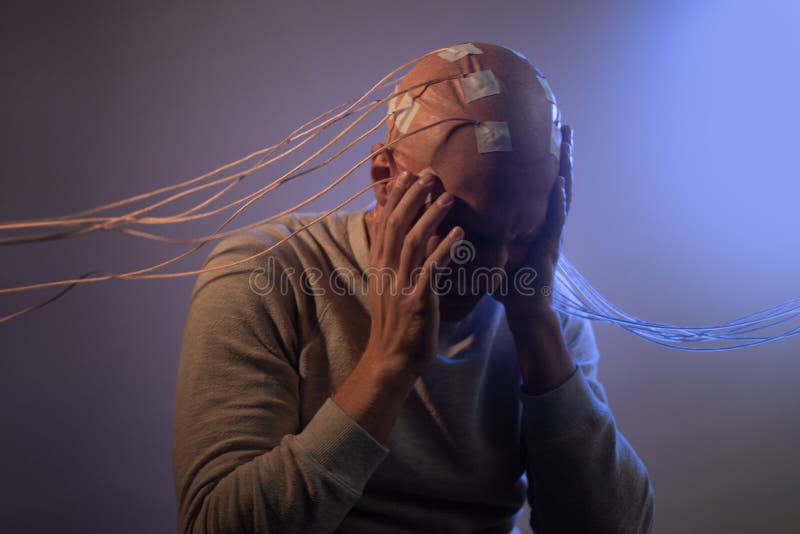 Person with Implants in Head Experiences Stress and Horror. New ...