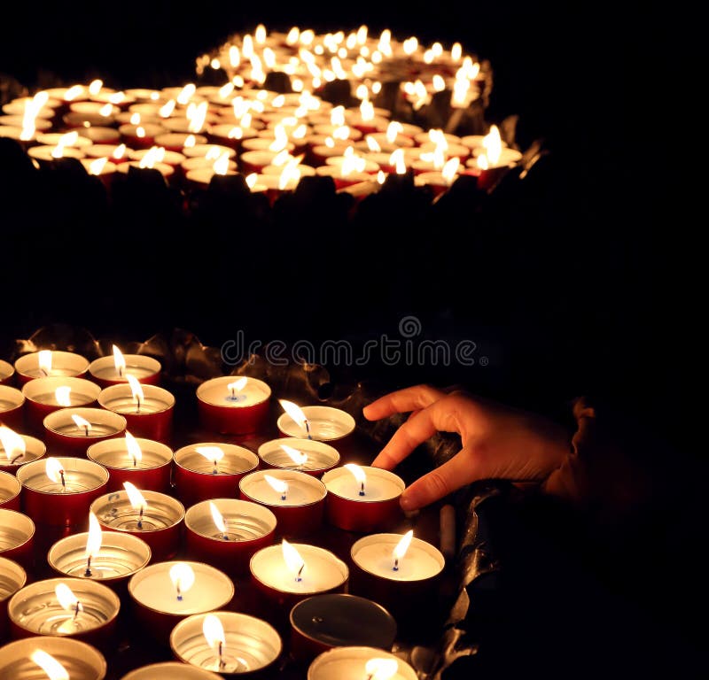 Person Lights a Candle during the Religious Ceremony Stock Photo ...