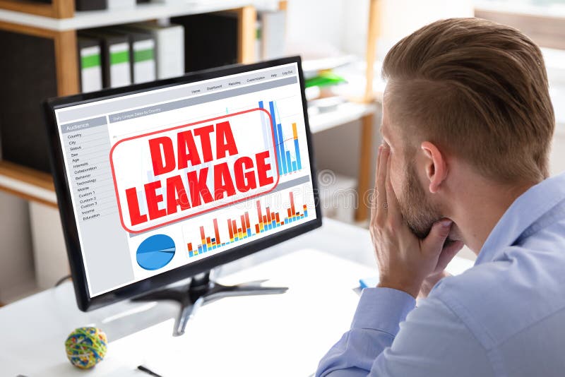 Man Looking at Computer Screen with Data Leakage Message Stock Image ...