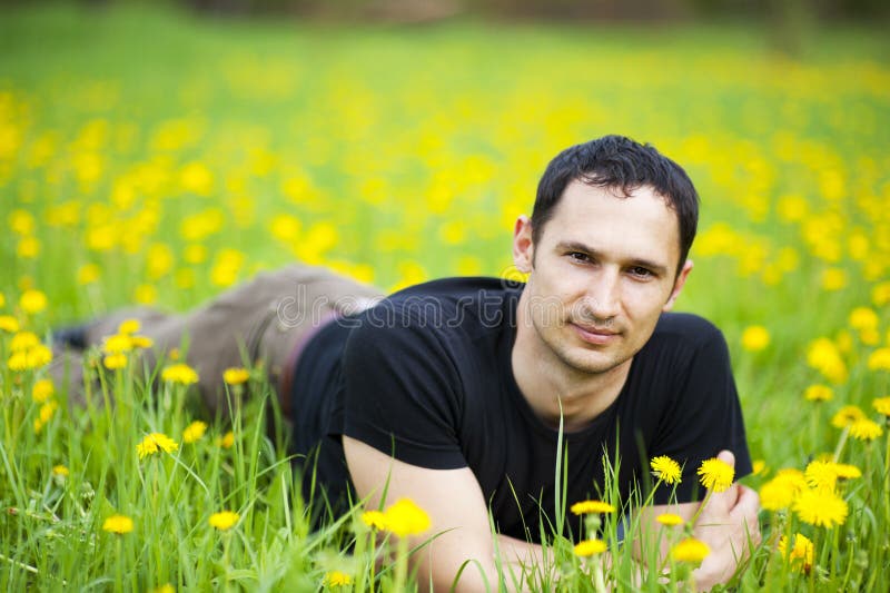 Person lying on grass stock image. Image of park, person - 24870651