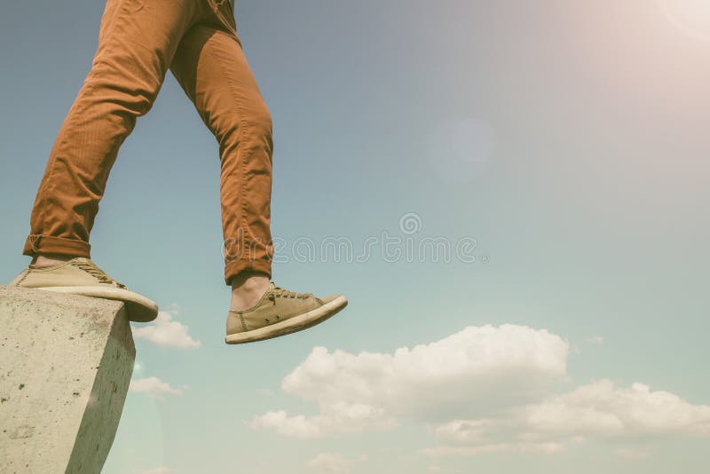 Person Makes Confident Step with Concrete Wall on the White Fluffy ...
