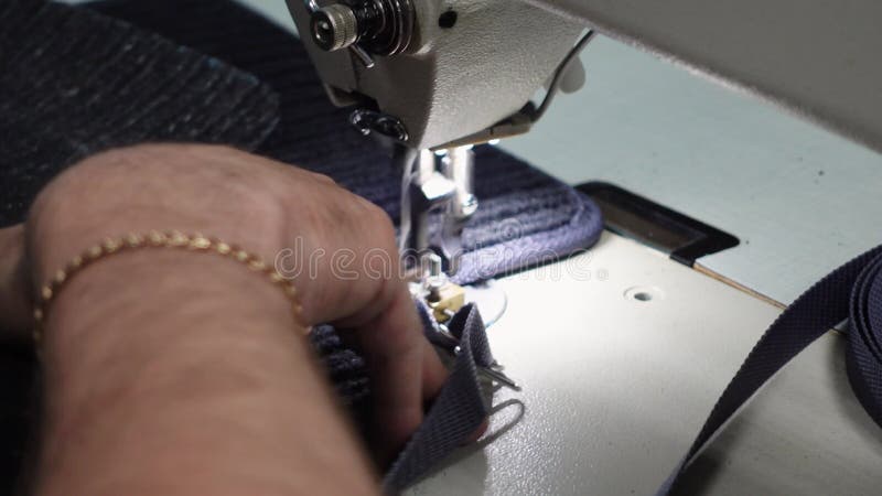 Person Makes Edging of Seam of Car Rug Using Automatic Sewing Machine ...