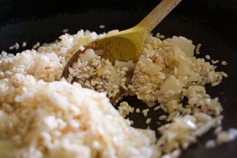 A Person Making Risotto in a Pan. Stock Photo - Image of organic ...
