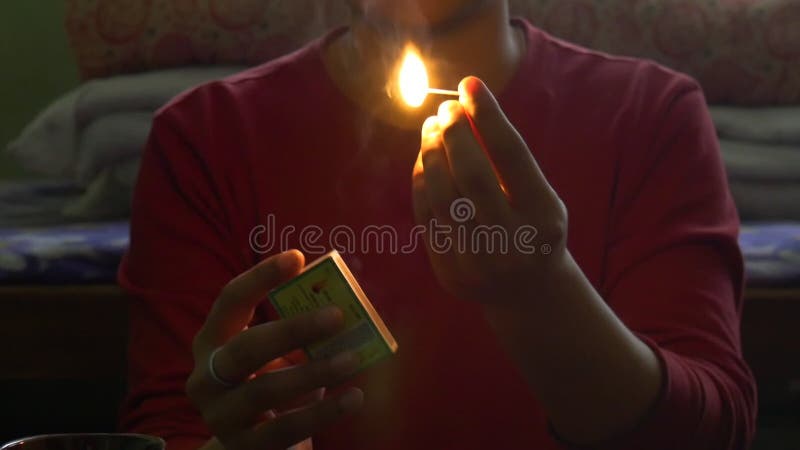 A Person or Man Lighting a Matchstick in Slow Motion Stock Video ...