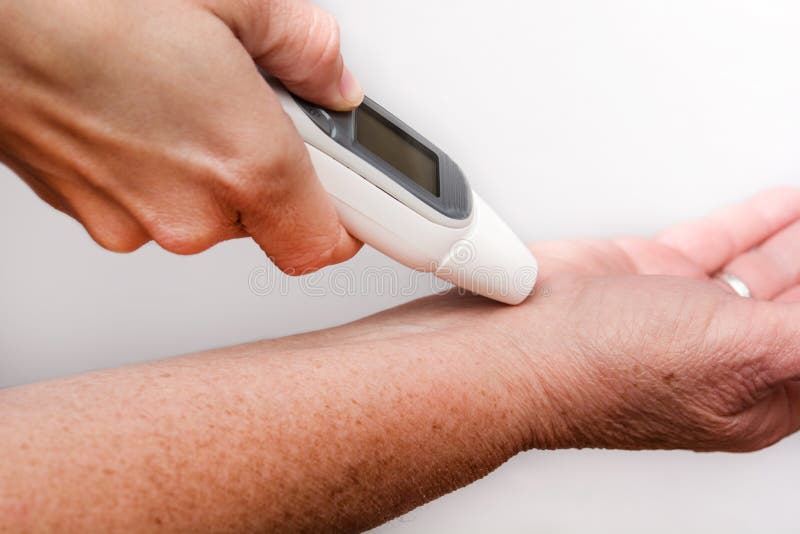 Person Measuring Temperature with Thermometer in Wrist Stock Image ...