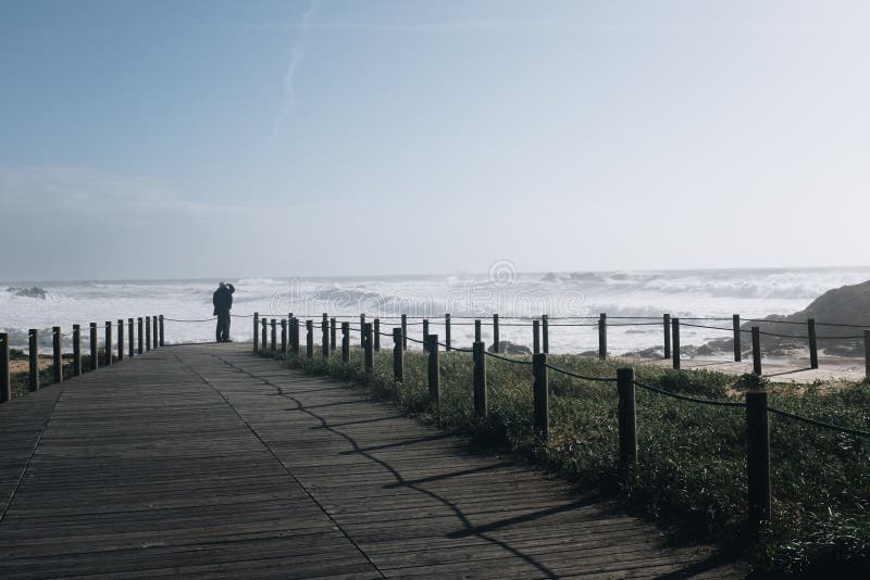 Person Near Body of Water stock photo. Image of shore - 115423200