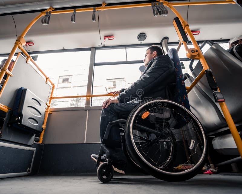 Person with a Physical Disability Inside Public Transport with an ...