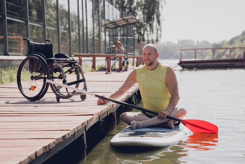 Person with a Physical Disability Ride on Sup Board Stock Photo - Image ...