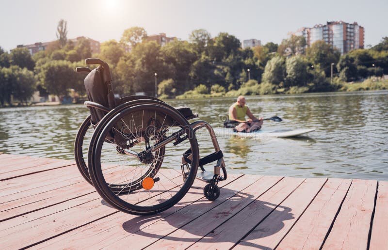 Person with a Physical Disability Ride on Sup Board Stock Image - Image ...