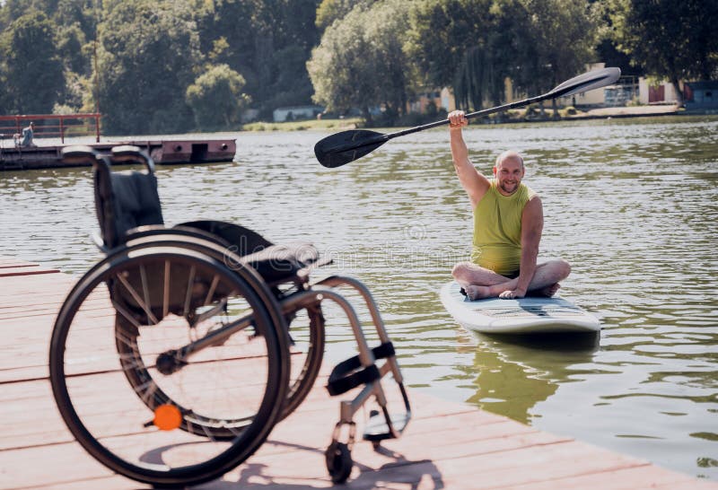 Person with a Physical Disability Ride on Sup Board Stock Photo - Image ...