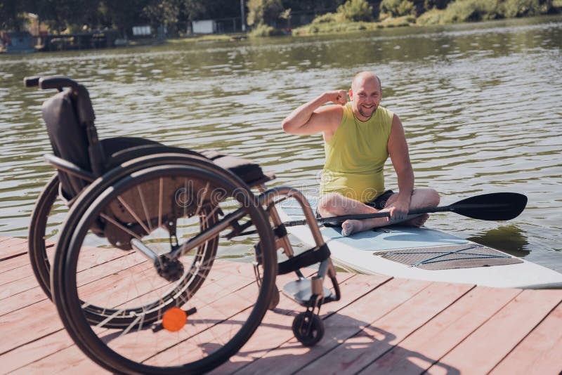 Person with a Physical Disability Ride on Sup Board Stock Photo - Image ...