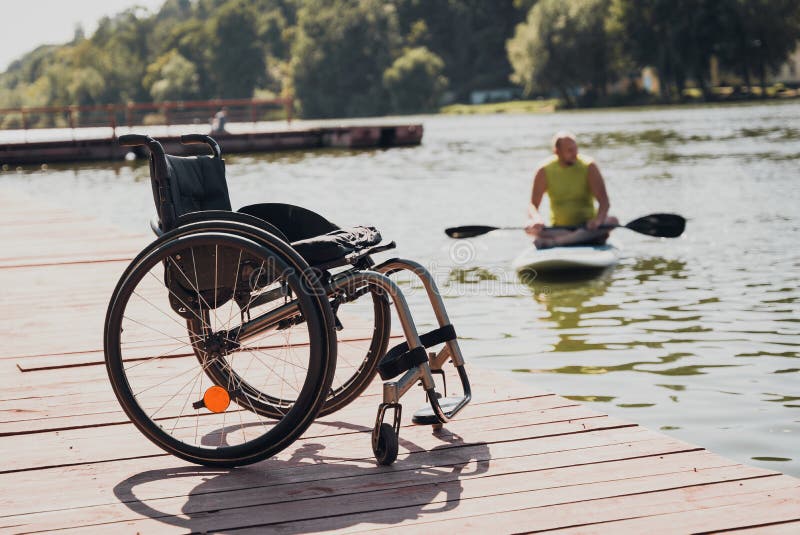 Person with a Physical Disability Ride on Sup Board Stock Photo - Image ...