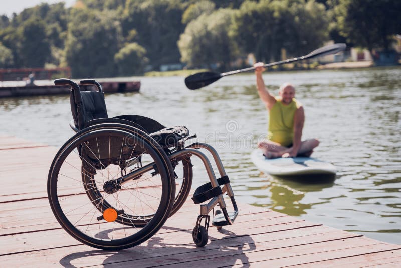 Person with a Physical Disability Ride on Sup Board Stock Image - Image ...