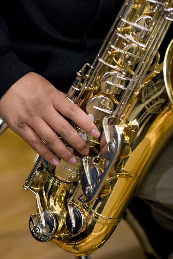 Person playing a saxophone stock photo. Image of musician - 2212060