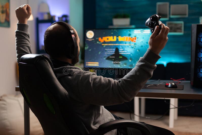 Person Playing Video Games with Controller and Winning Stock Photo ...