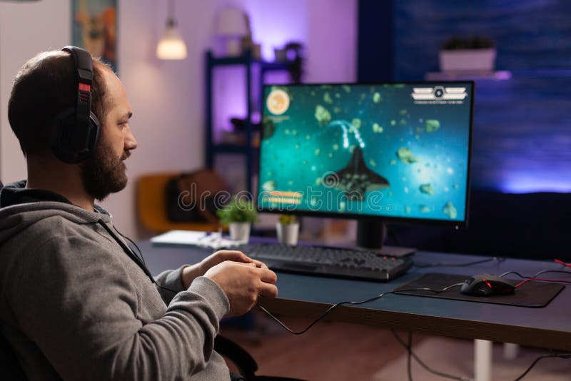 Person Playing Video Games with Joystick and Headset Stock Image ...