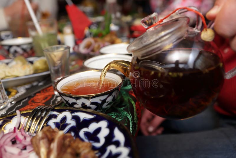 Person pouring tea stock image. Image of glass, refreshment - 61655253