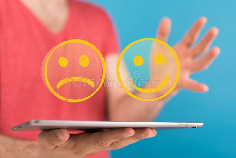 Person Presenting the Virtual Projection of Happy and Sad Emojis Stock ...