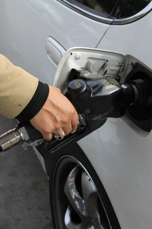 Person Pumping Gas stock image. Image of human, gasoline - 19433641