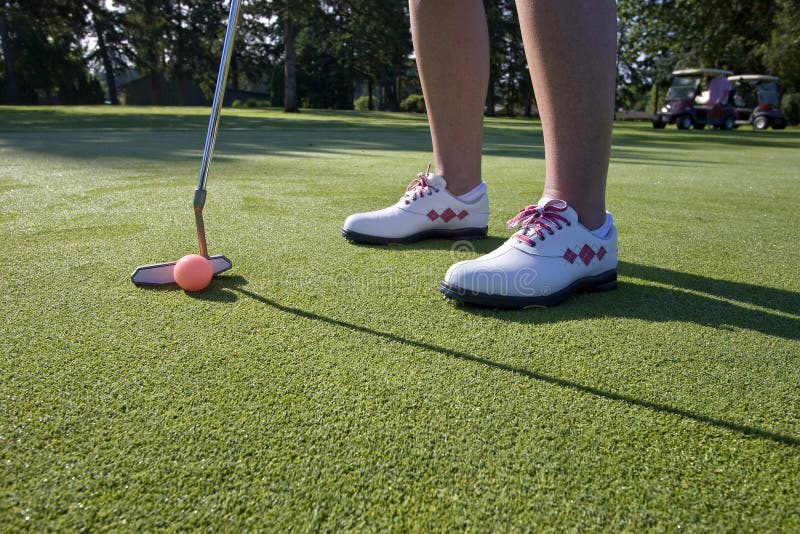 Person Putting on Golf Course - Horizontal Stock Photo - Image of stand ...