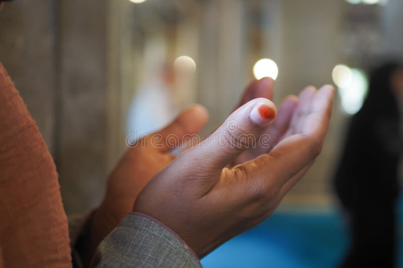 A Person Raises Their Hands in Prayer, Showing Devotion and Focus Stock ...
