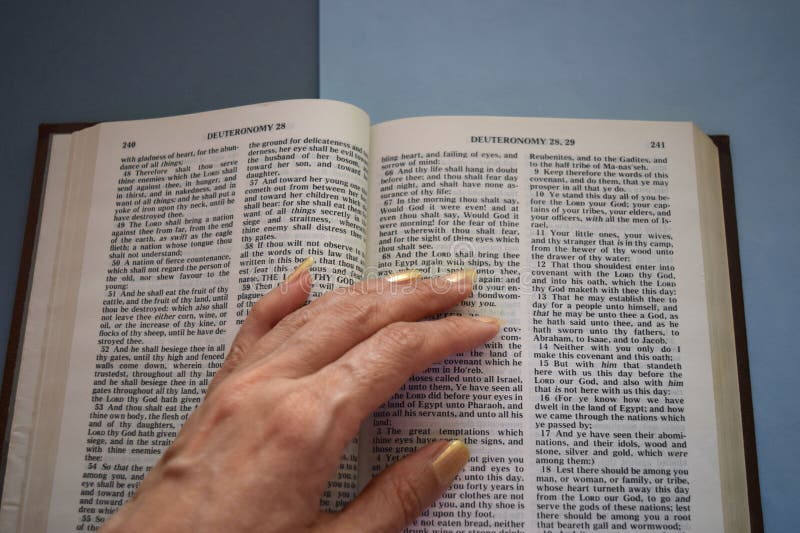 Person is reading Bible. stock image. Image of faith - 273517347