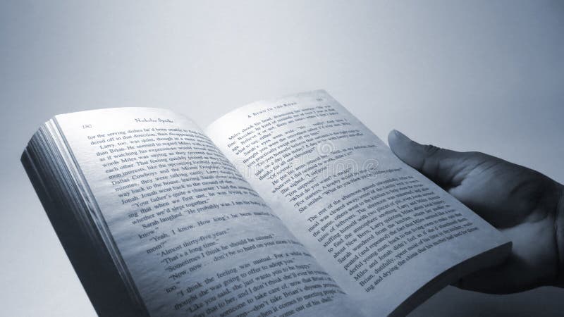 A person reading a book stock image. Image of learn - 165274415