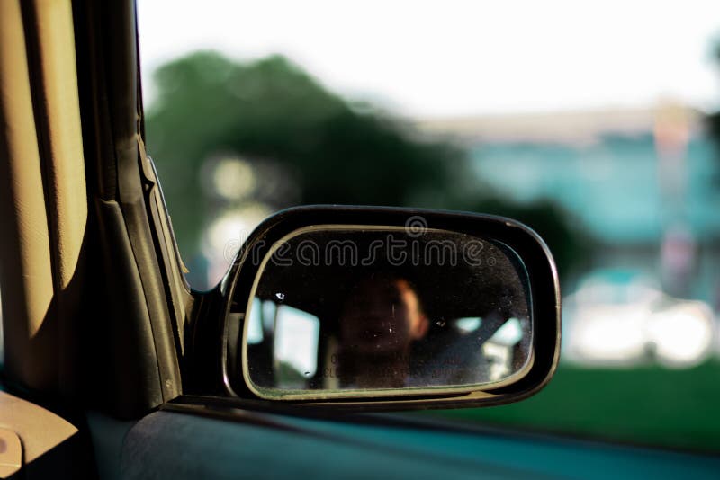 Person Reflecting in Car Side Mirror Stock Image - Image of people ...