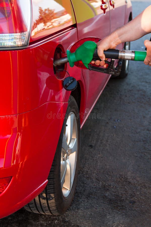 Person Refueling a Car at Gas Station Stock Image - Image of expensive ...