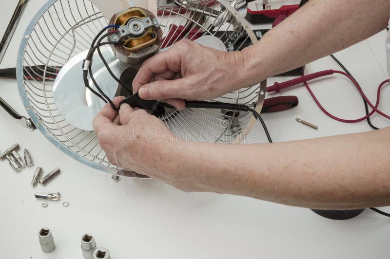Person repair the fan stock image. Image of electrician - 72791967