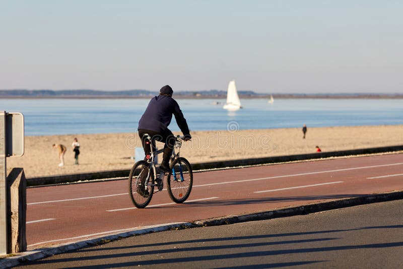 Person Riding a Bicycle on a Cycle Path Editorial Photo - Image of ...