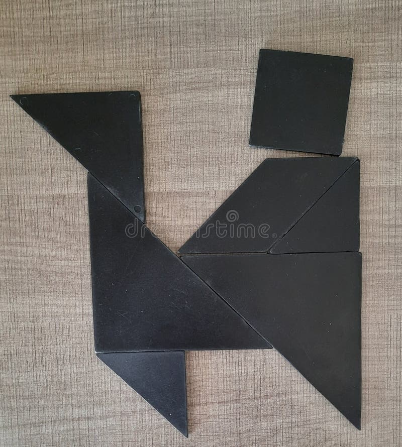 A Person Riding on a Camel in the Form of a Tangram Puzzle Stock Photo ...