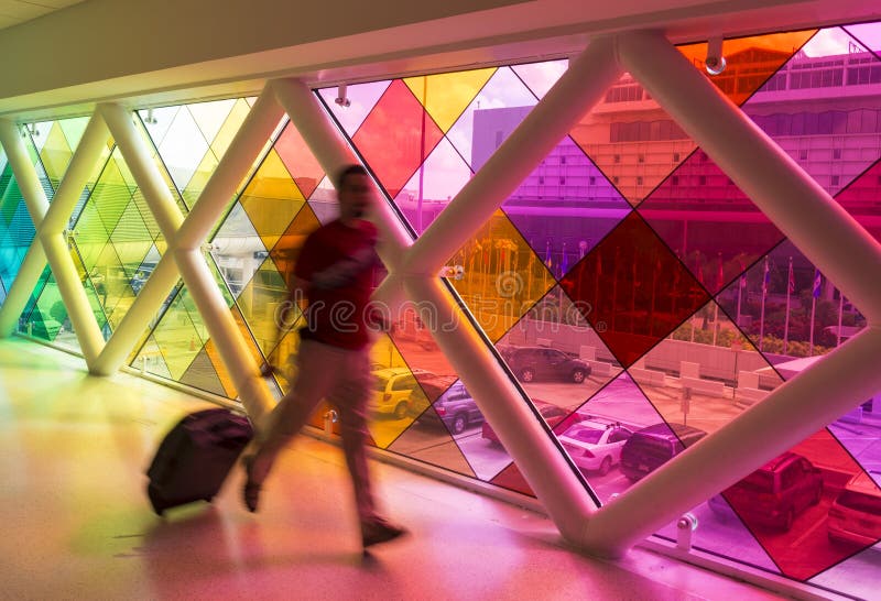 Person Rushing Out in Airport Stock Image - Image of baggage, travel ...
