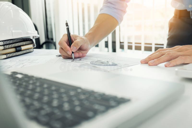 Person& X27;s Engineer Hand Drawing Plan on Blue Print with Architect ...