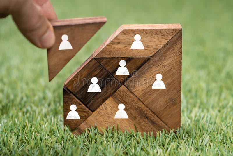 Human Hand Building Tangram Square Block with Human Figures Stock Image ... Human Hand Building Tangram Square Block with Human Figures Stock Image ...