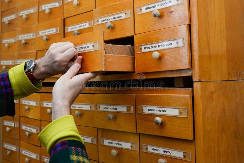 Database Cabinet and Human Hand Opens Card Drawer Stock Photo - Image ...