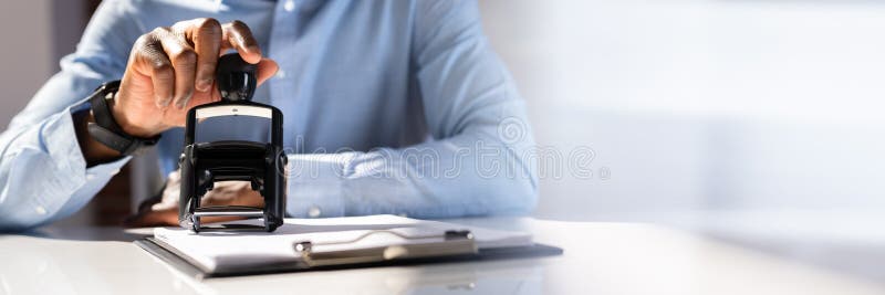Person S Hand Stamping with Approved Stamp Stock Photo - Image of ...
